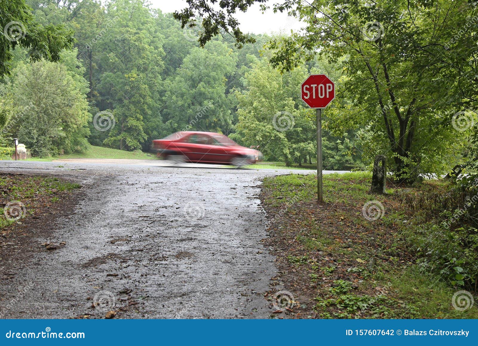 Blurred Car on the Main Road in Motion Looking from a Side Road. Stop ...