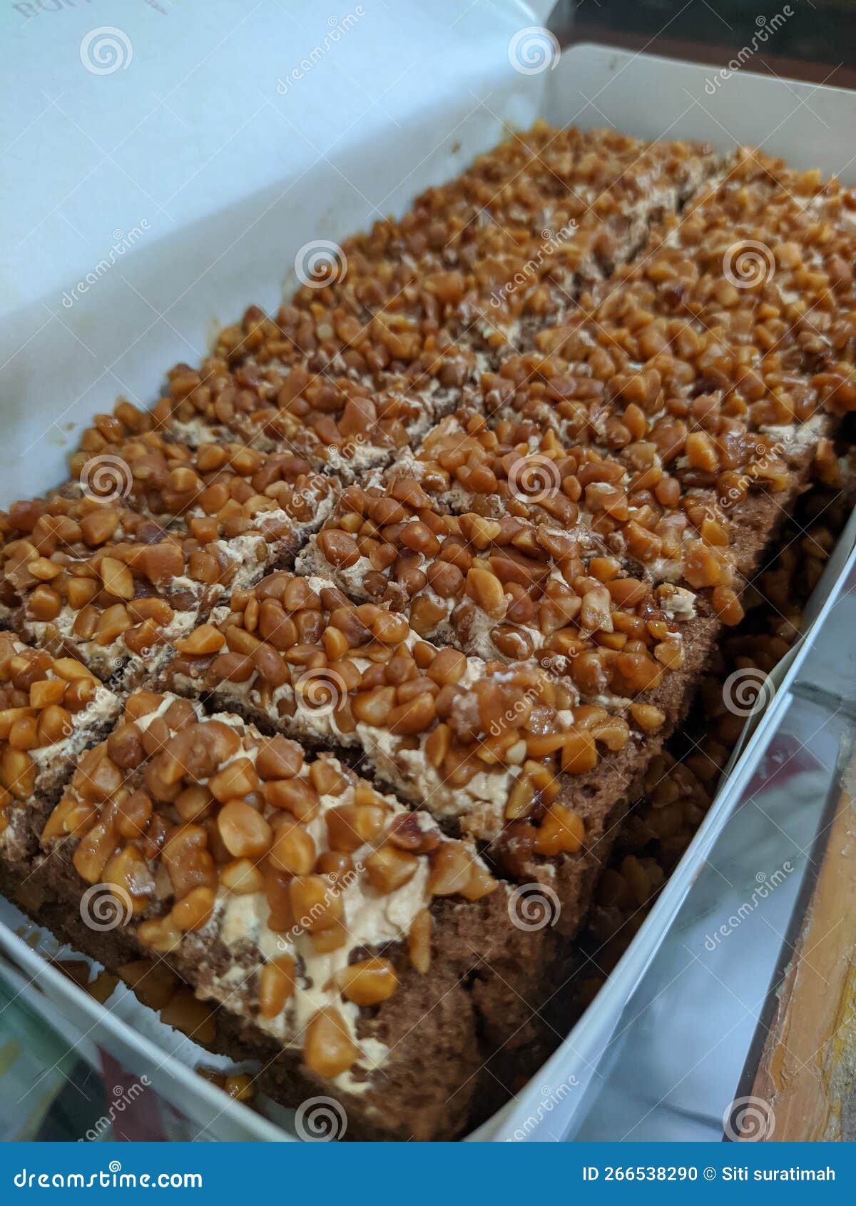Blurred Chocolate Cake with Peanut Topping Stock Photo - Image of ...