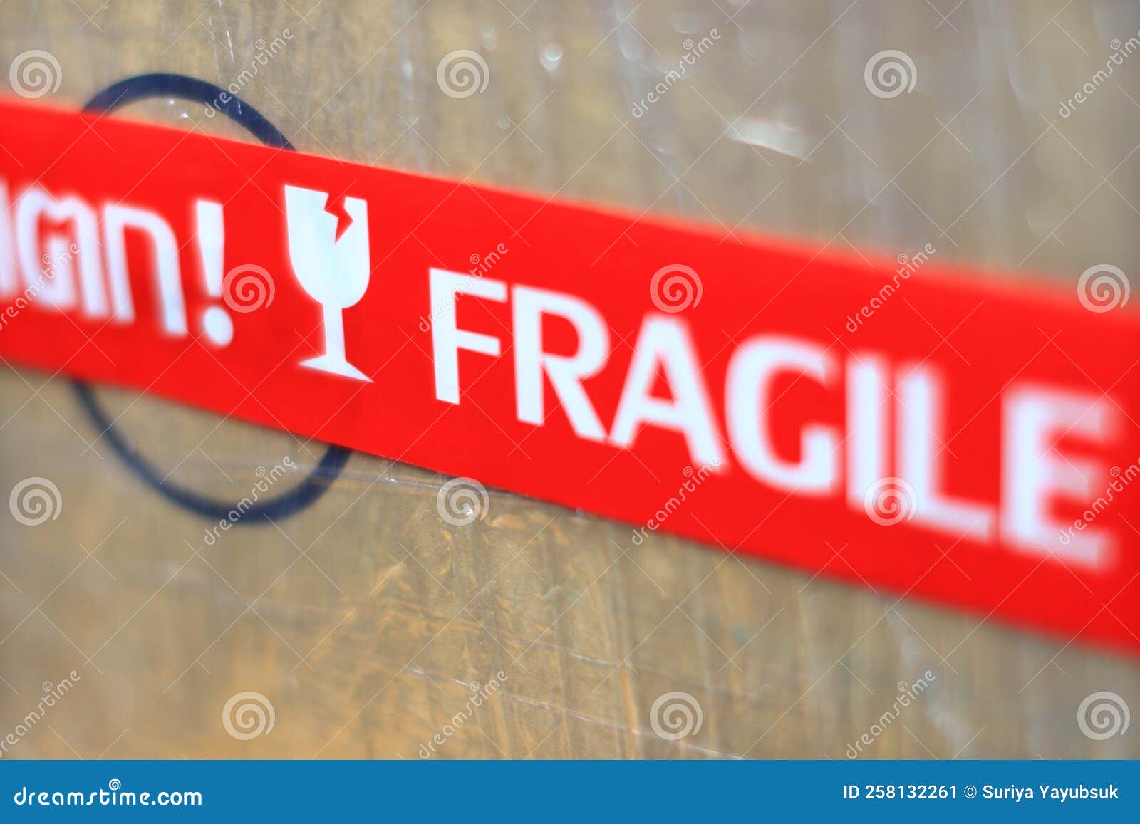 Blurred Close Up Red Fragile Sticker on a Parcel with Shallow Focus ...