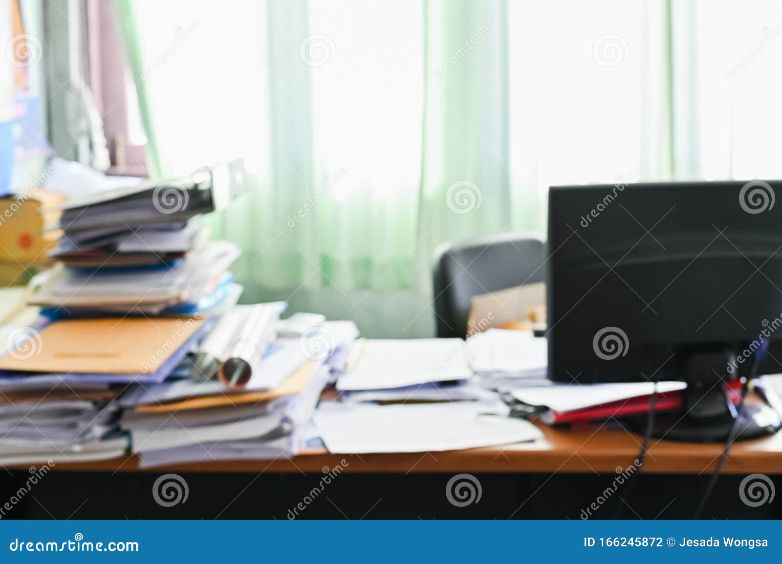 Blurred of Cluttered Desk, Full of Documents a Mess Desk with Many ...