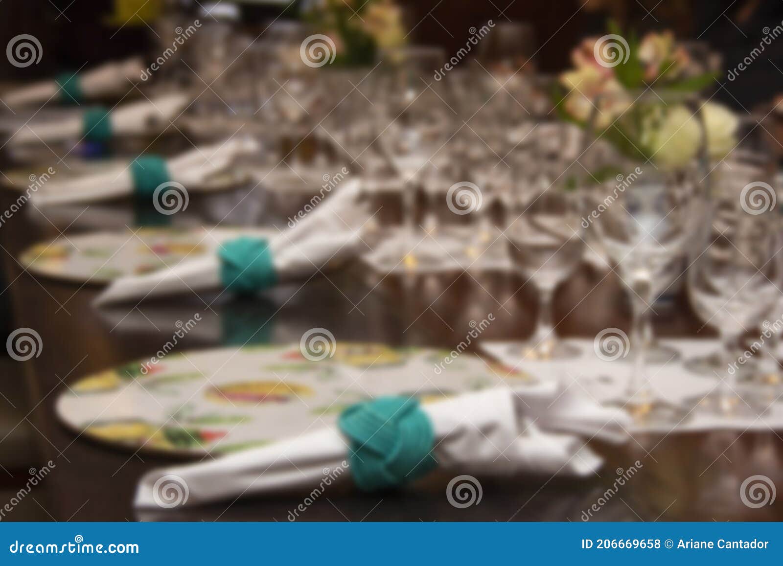 Blurred Dining Table with Bowls and Dishes Set for Dinner and Wine ...