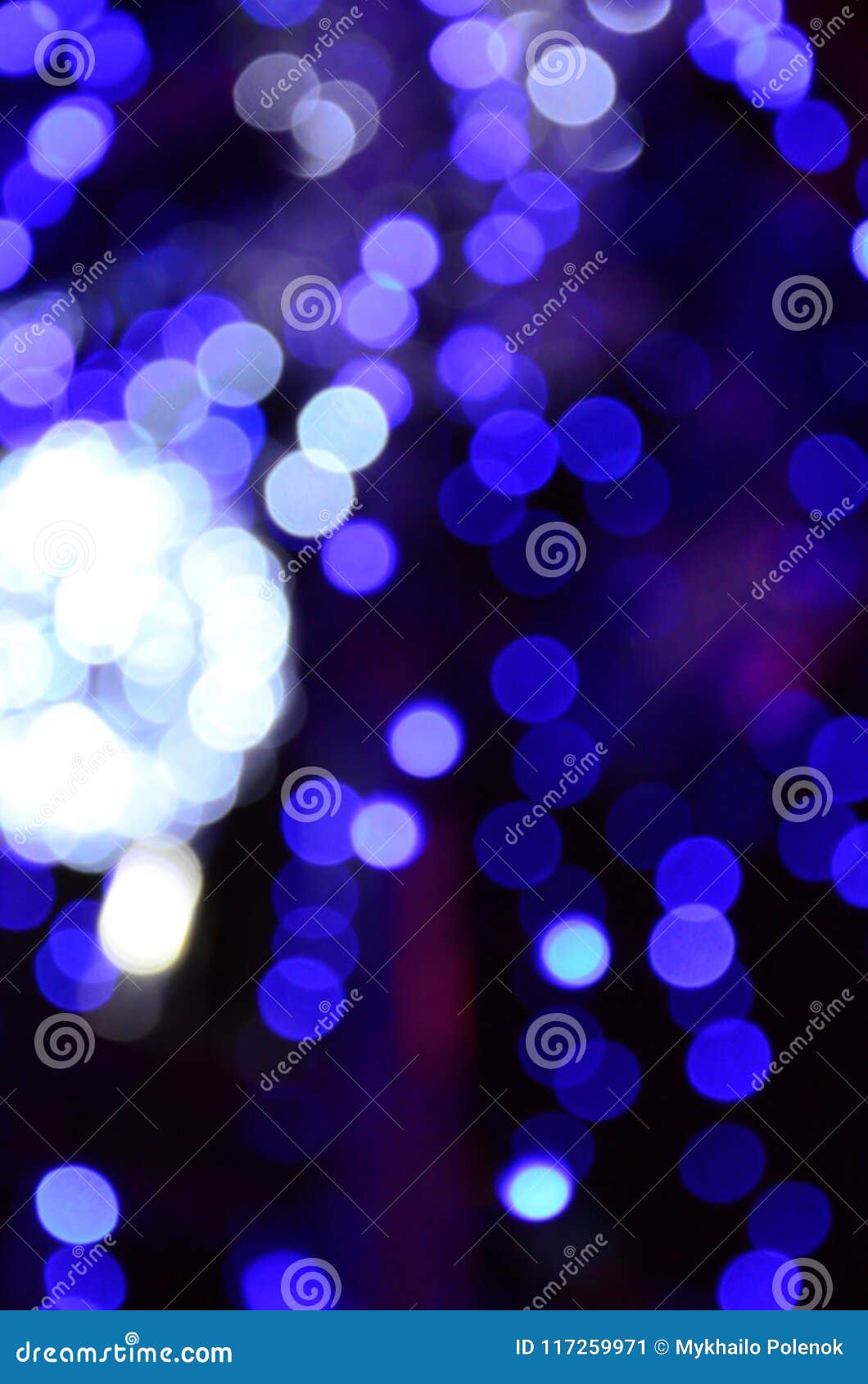 Blurred Fragment of the New Year Tree. Lots of Round Lights in Blue ...