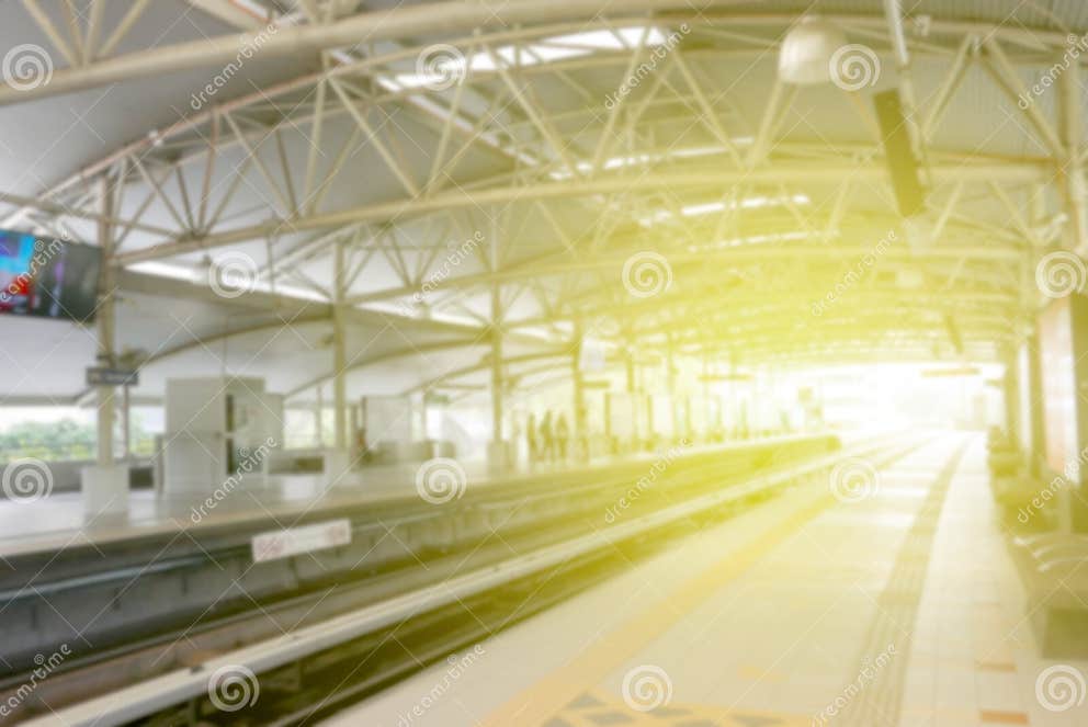 Blurred Image of Train Station with Sun Flare. Stock Image - Image of ...