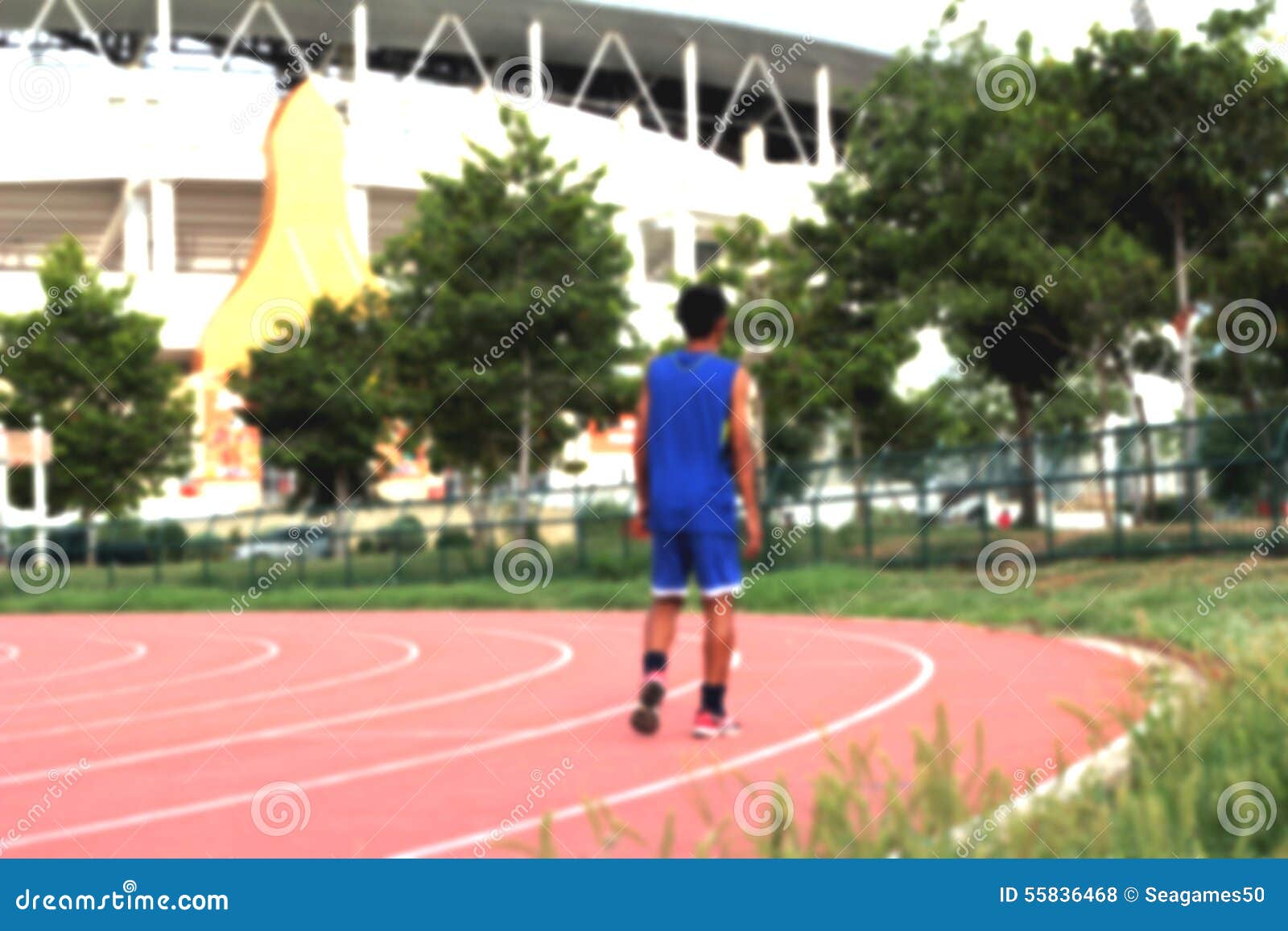 Blurred Man Running Track for in the Stadium. Stock Photo - Image of ...