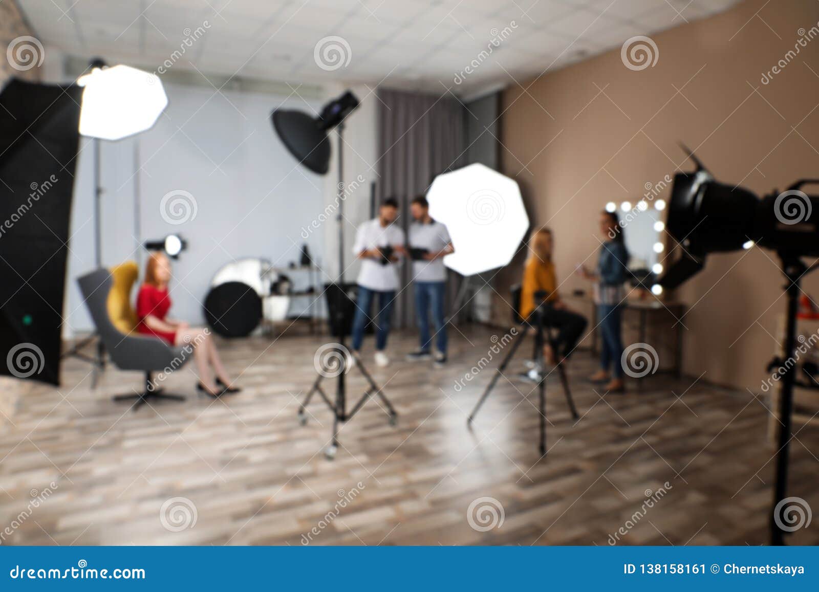 Blurred Photo Studio with Professional Equipment and Team Stock Image ...