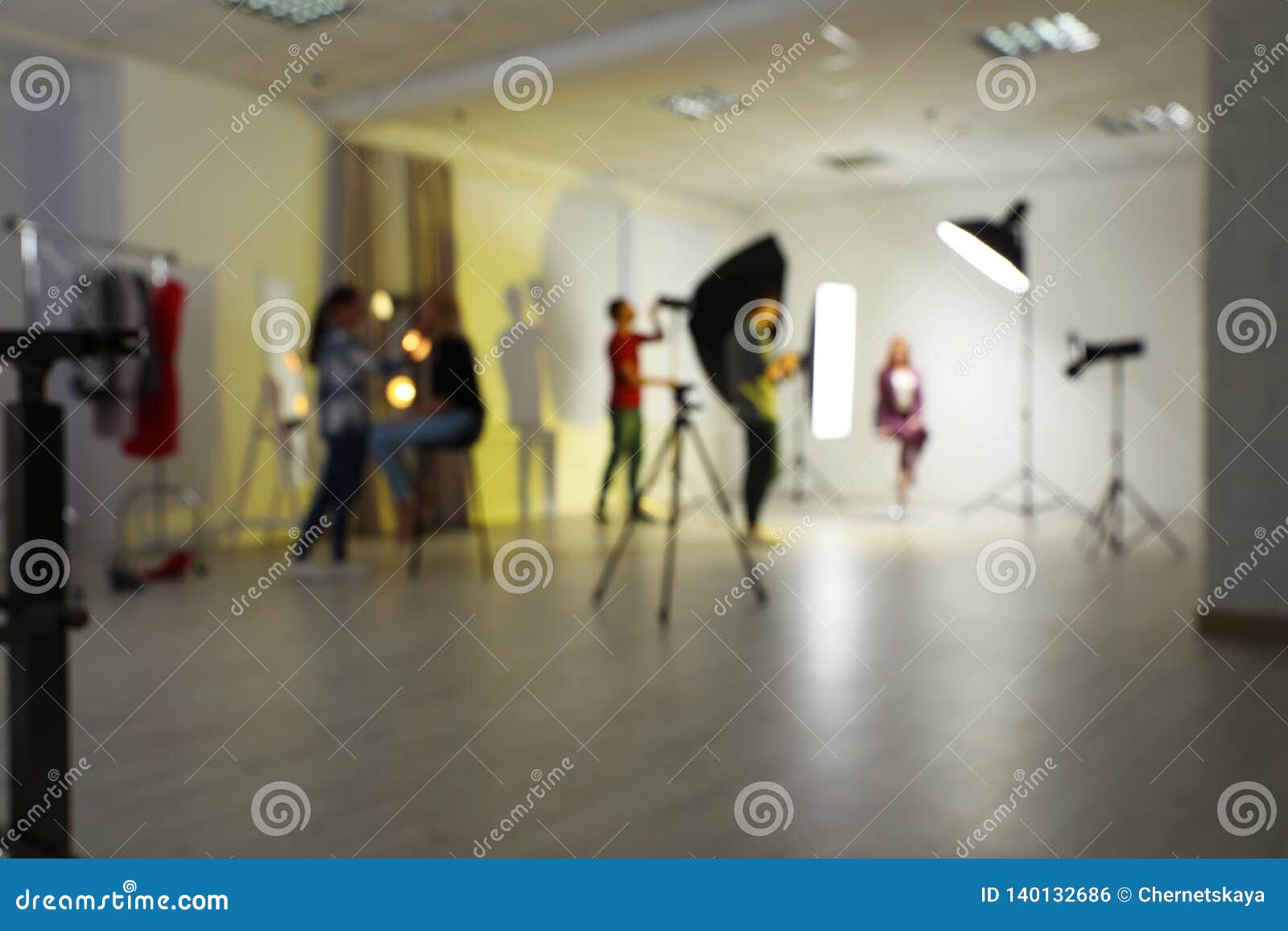 Blurred Photo Studio with Professional Equipment and Team Stock Photo ...