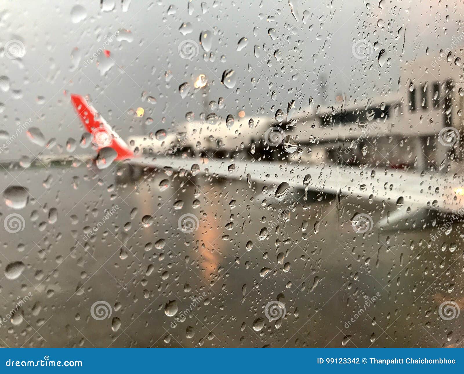 The Blurred Picture of Runway that is Raining Outside Stock Photo ...