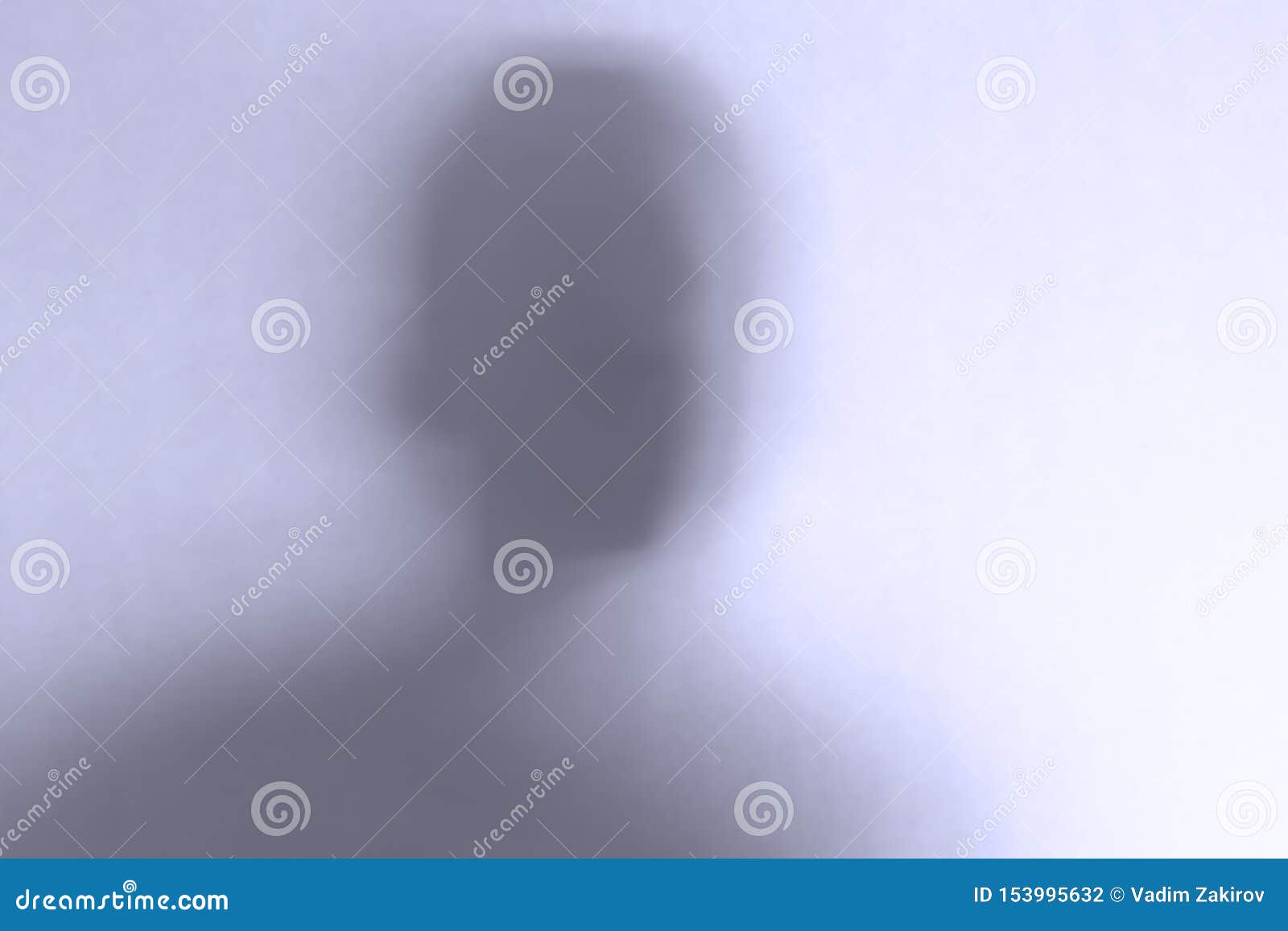 Defocused Scary Ghost Face Behind a White Glass Background Stock Photo ...
