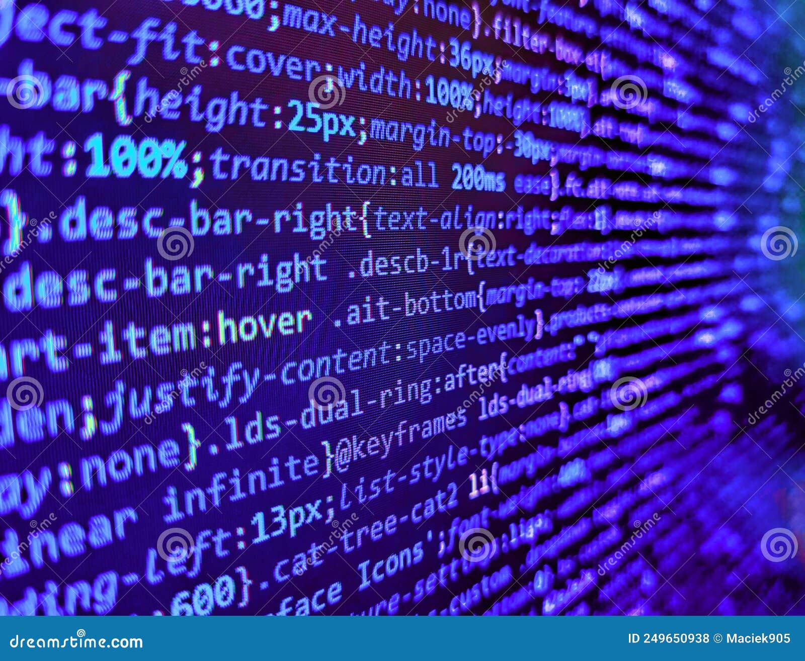 Blurred Screen With Selective Focus Programmer Working In Computer Screen Database Bits Access
