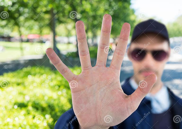 Blurred Security Guard Saying Stop with His Hand in the Park Stock ...
