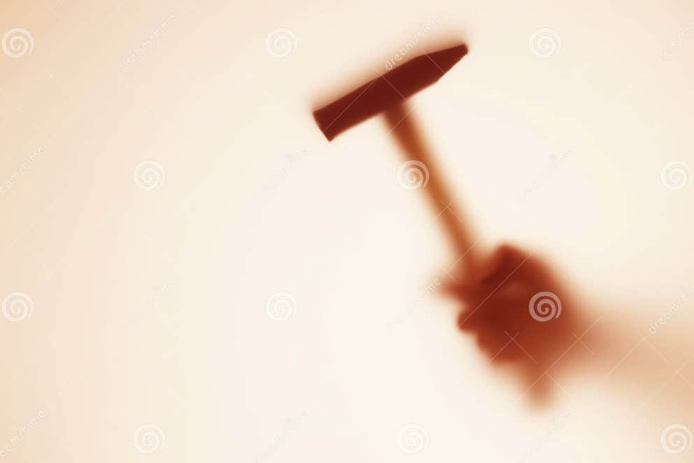 Blurred Shadow of a Hand with a Hammer Outside the Window. the Concept ...