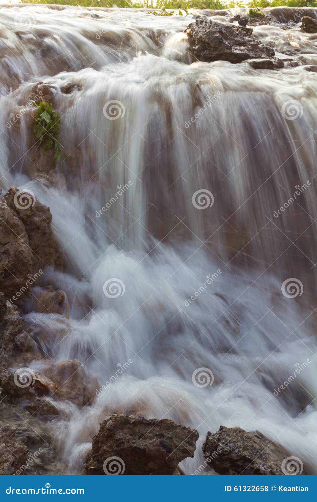 Blurred stream waterfall. stock photo. Image of life - 61322658