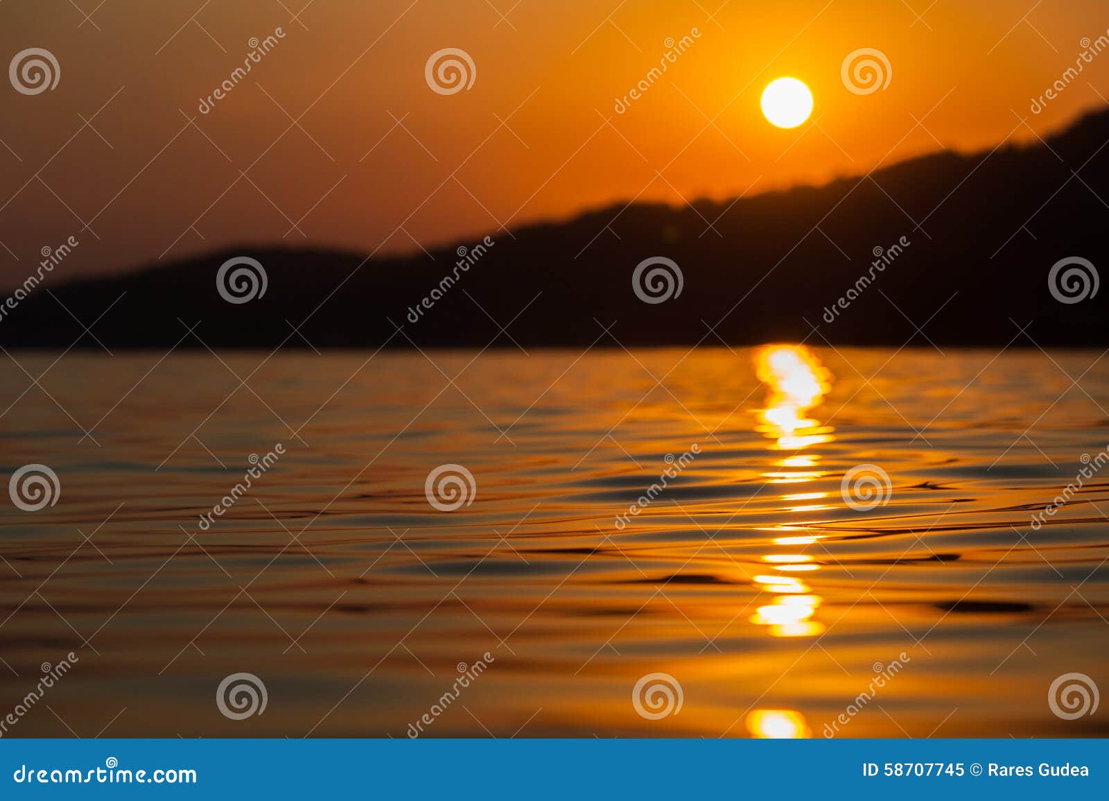 Blurred Sunset at Sea Level Stock Image - Image of sunlight, blue: 58707745
