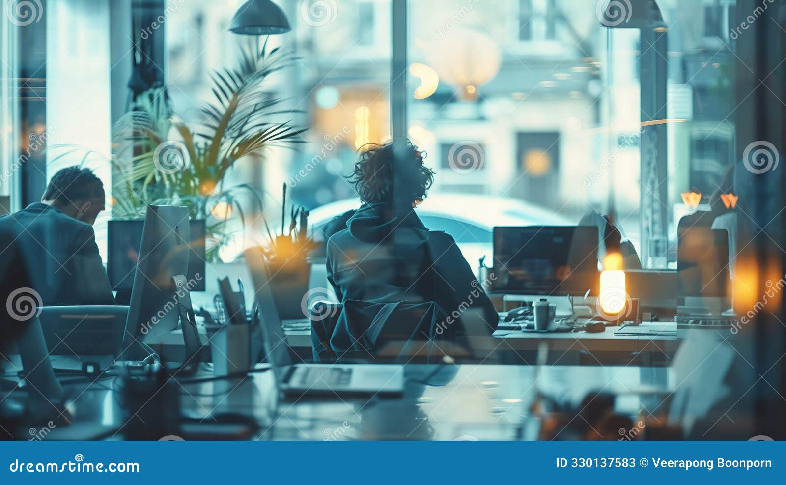 Blurred View of Busy Office, People Working Behind Glass Wall ...