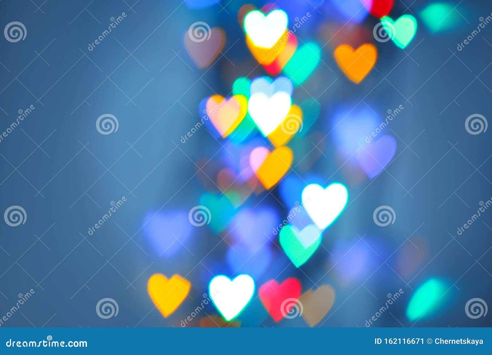 Blurred View of Colorful Heart Shaped Lights on Blue Background Stock ...