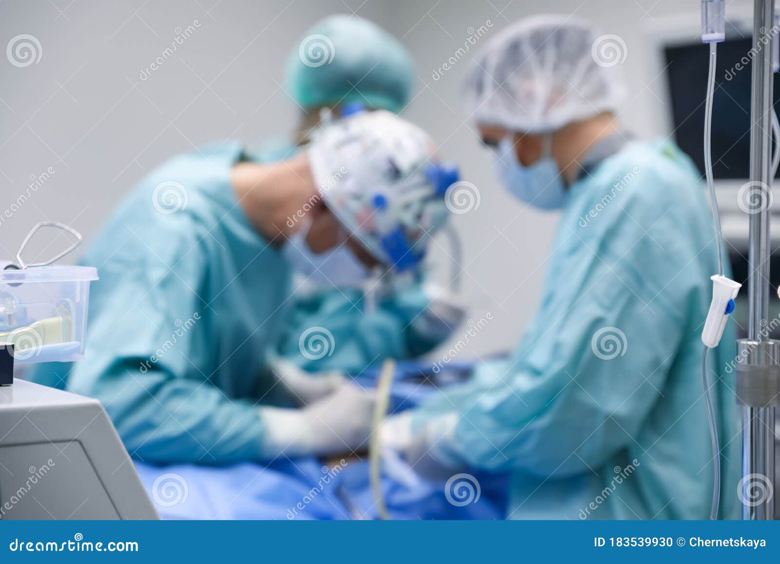 View of Doctors Operating Patient in Surgery Room Stock Photo - Image ...