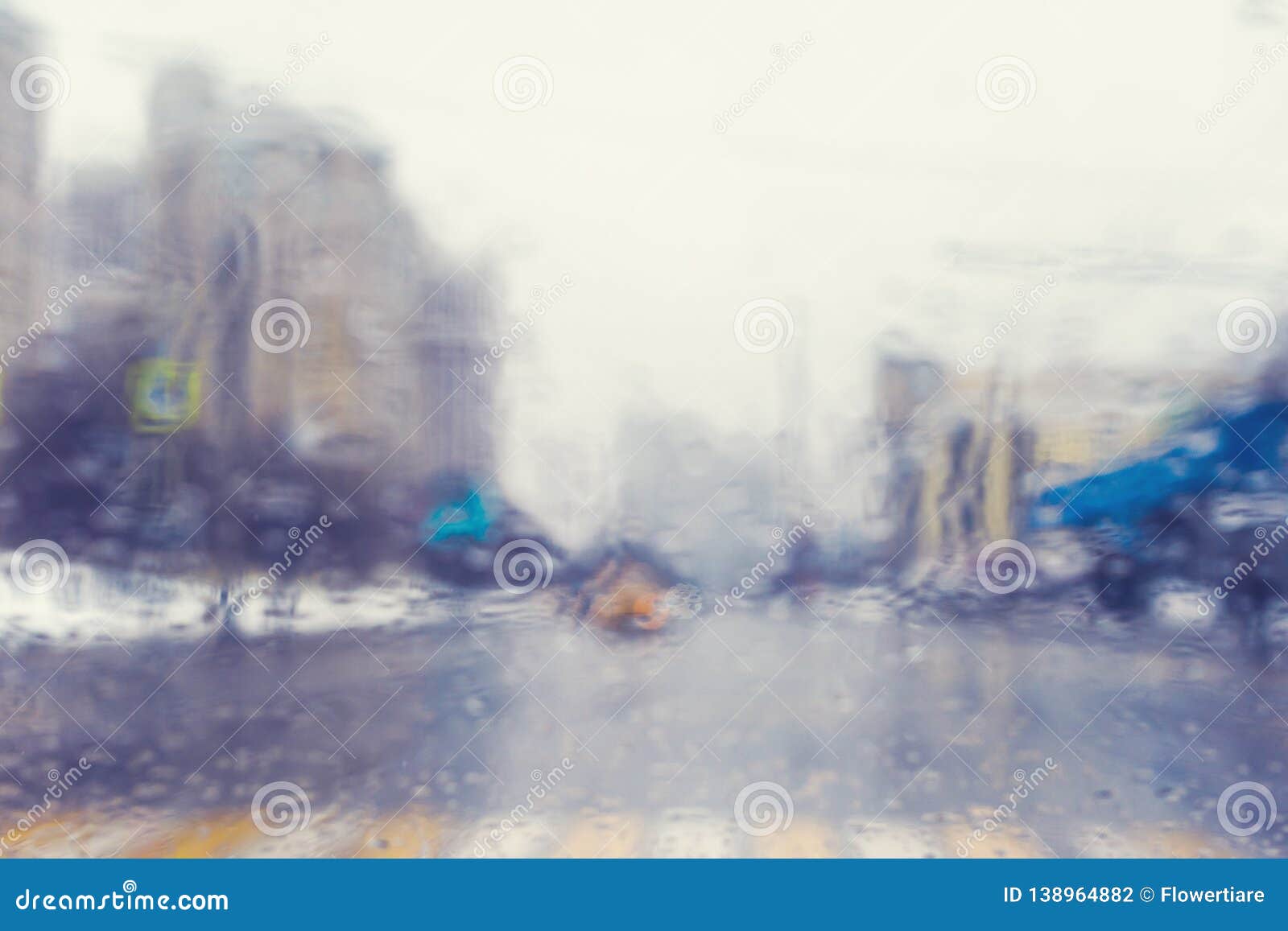 Blurred View through the Windshield of a Car with Raindrops at a ...
