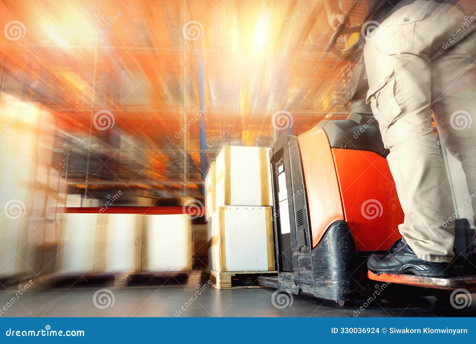 Package Boxes With Hand Pallet Truck In Blurred Warehouse Space ...