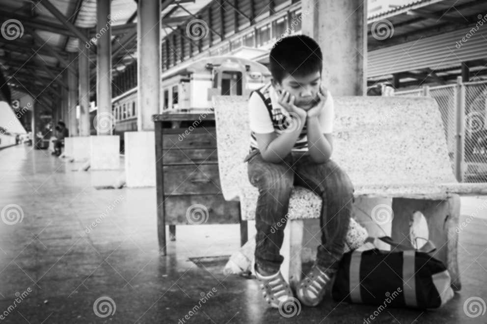 Blurry Abstract of the Little Boy Standing Alone Stock Photo - Image of ...