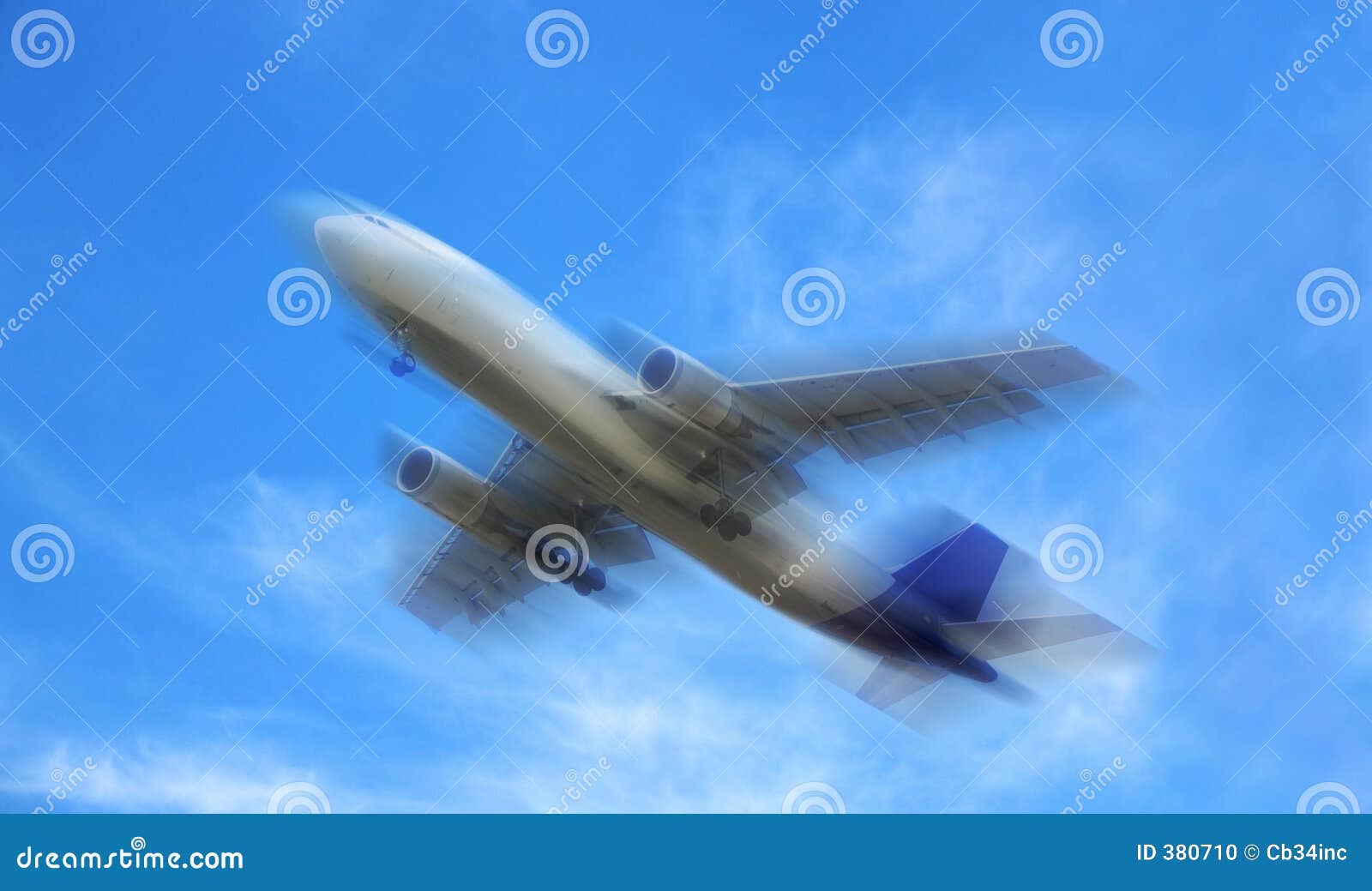 Blurry airplane stock photo. Image of elevation, cloud - 380710
