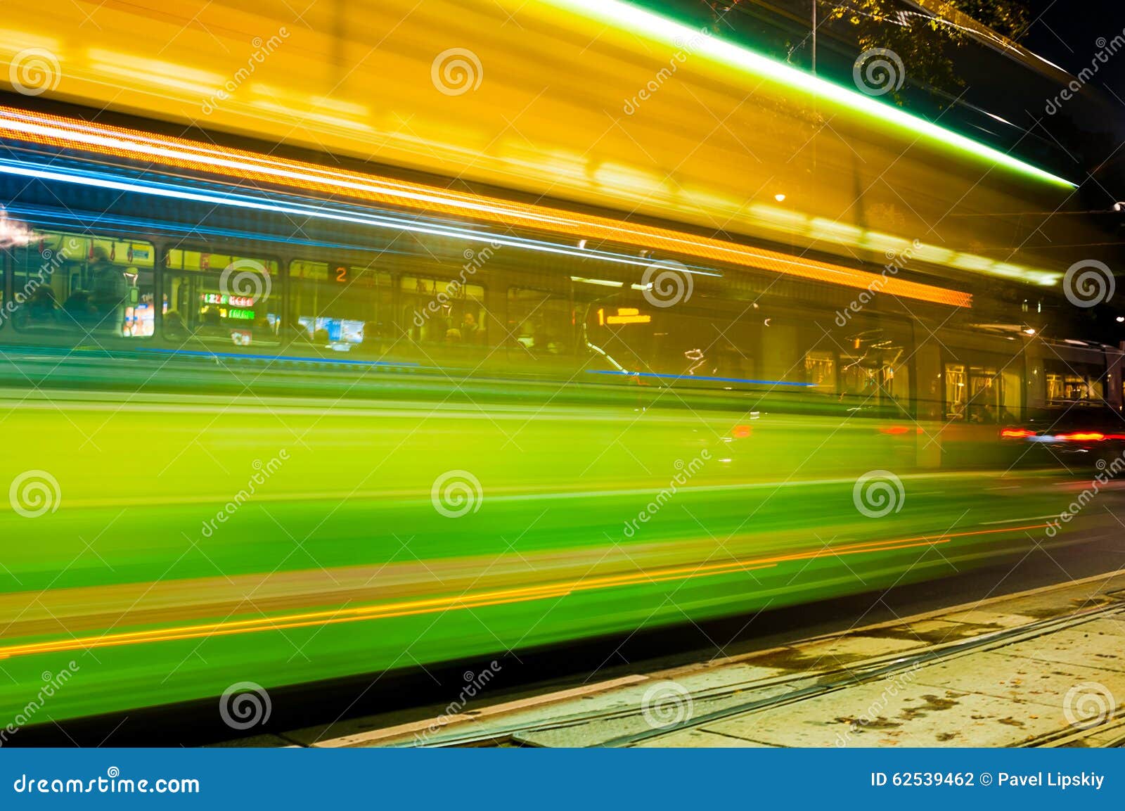 Blurry Green Lights City Bus at Night Stock Photo - Image of blurry ...