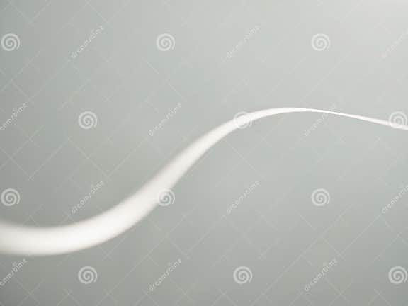 A Blurry Image of a Curved Line with a Gray Background. Stock Image ...