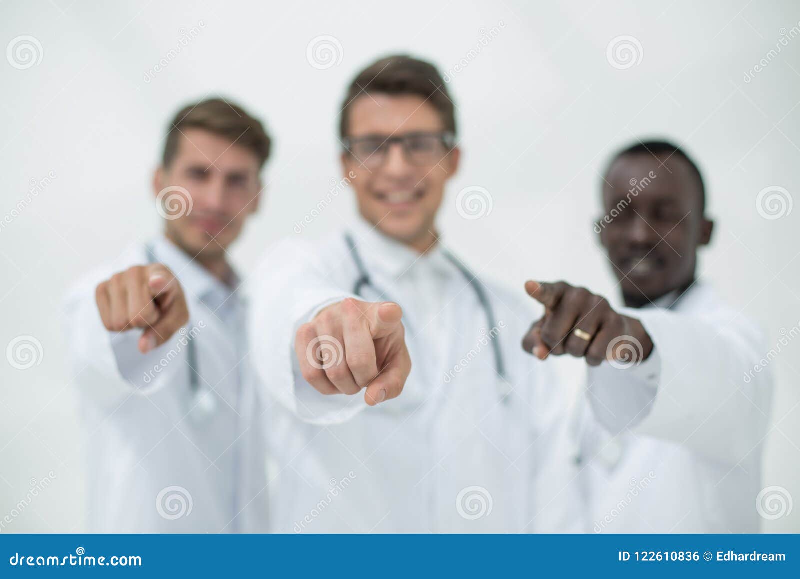 Blurry Image of a Group of Doctors Pointing at You Stock Photo - Image ...