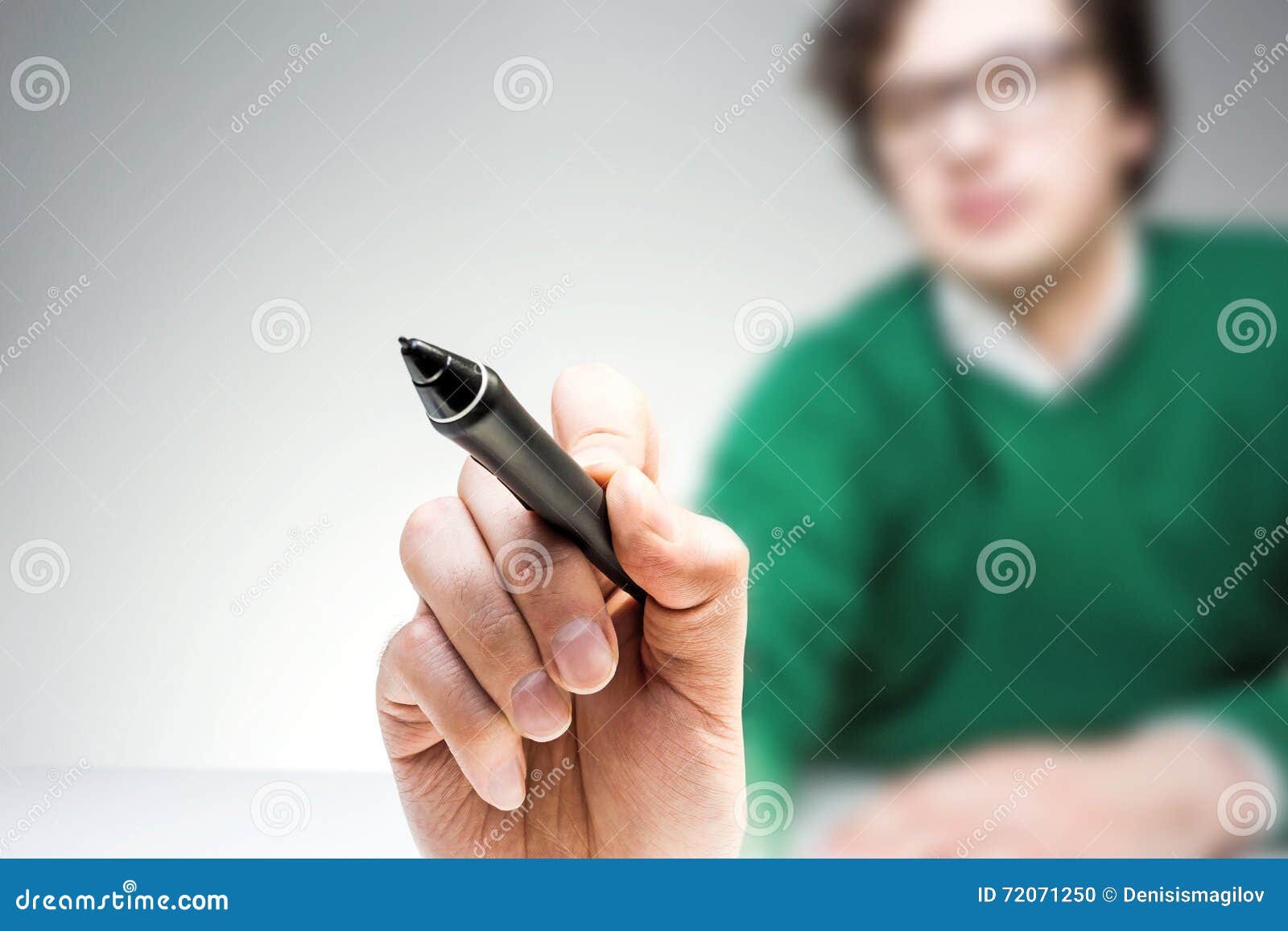 Blurry man writing stock photo. Image of european, desktop - 72071250