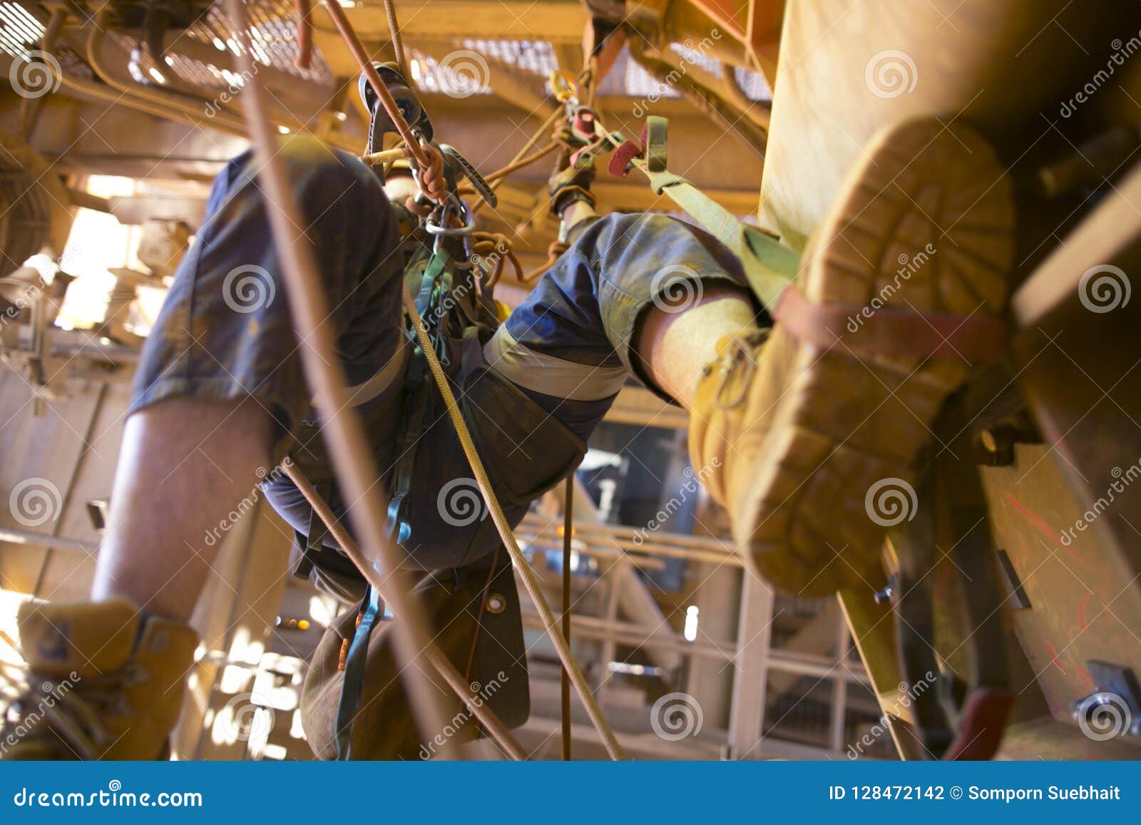 Blurry Picture of Rope Access Miner Working at Height Hangin on Two ...