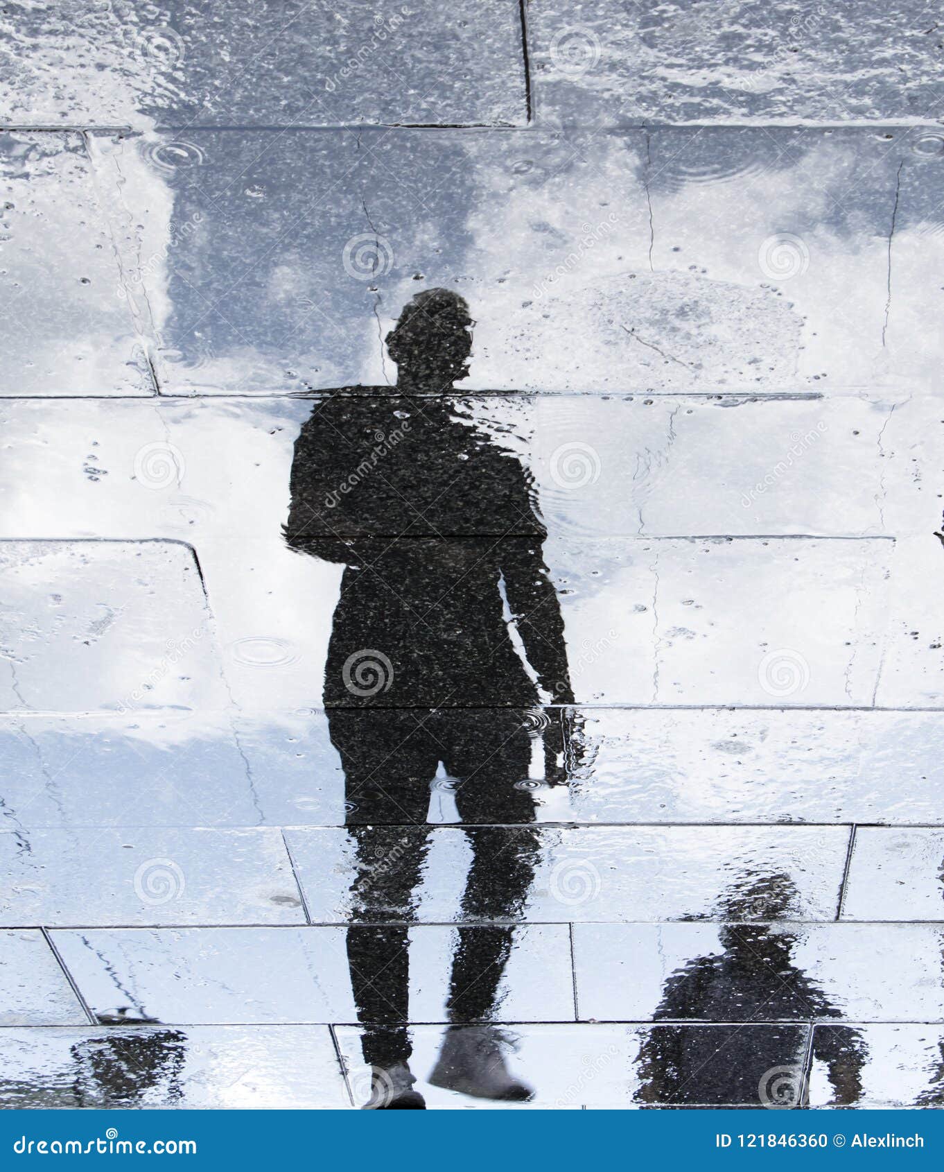 Blurry Reflection Silhouette Of A Couple Walking On Wet City Street ...