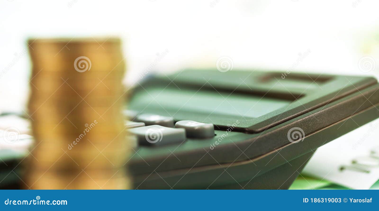 Blurry Stack of Coins by Black Calculator Screen Closeup Stock Image ...