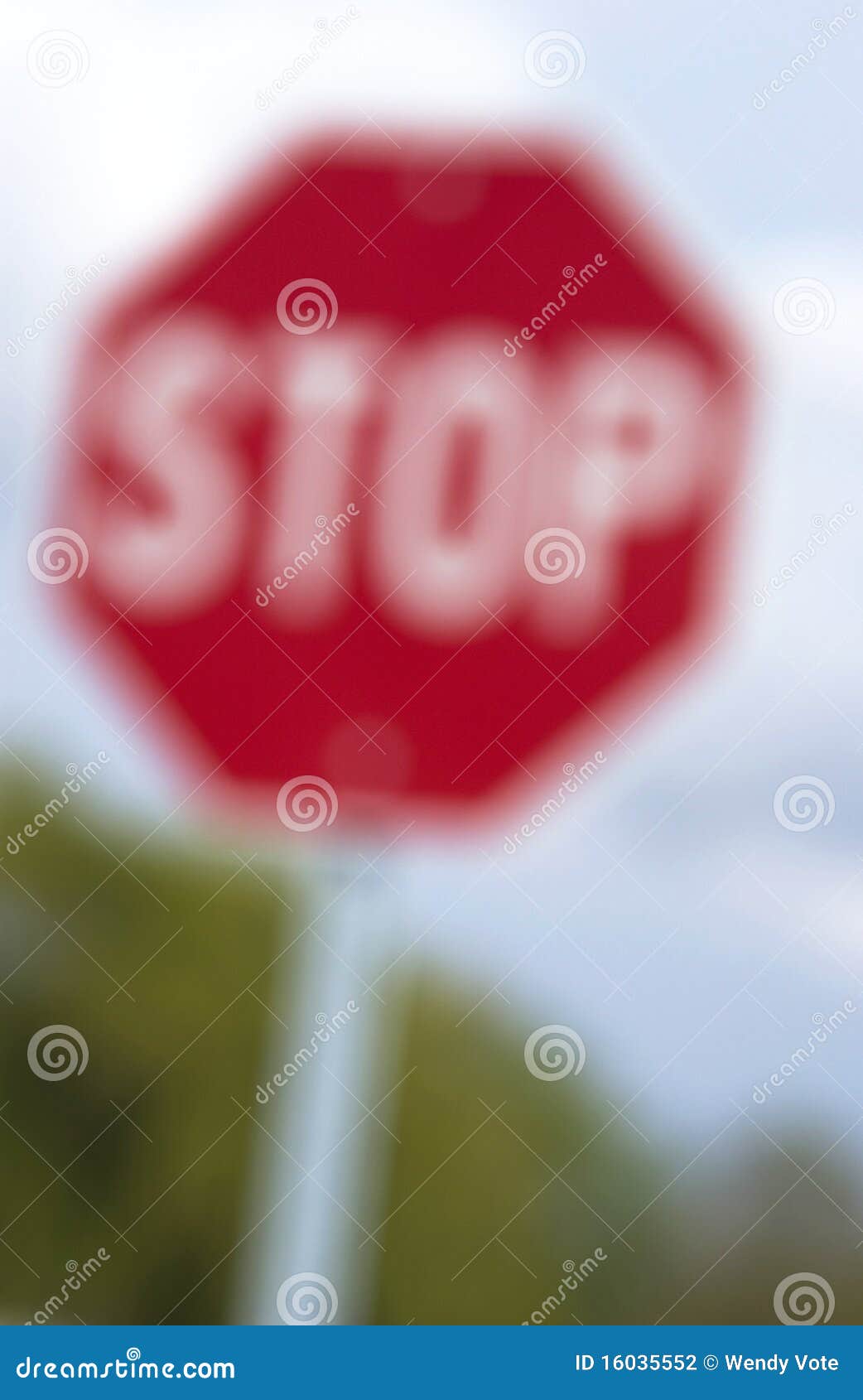 Blurry stop sign stock photo. Image of road, nearsightedness - 16035552