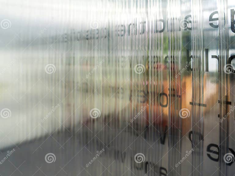 Blurry Text on Translucent Textured Surface Stock Photo - Image of ...