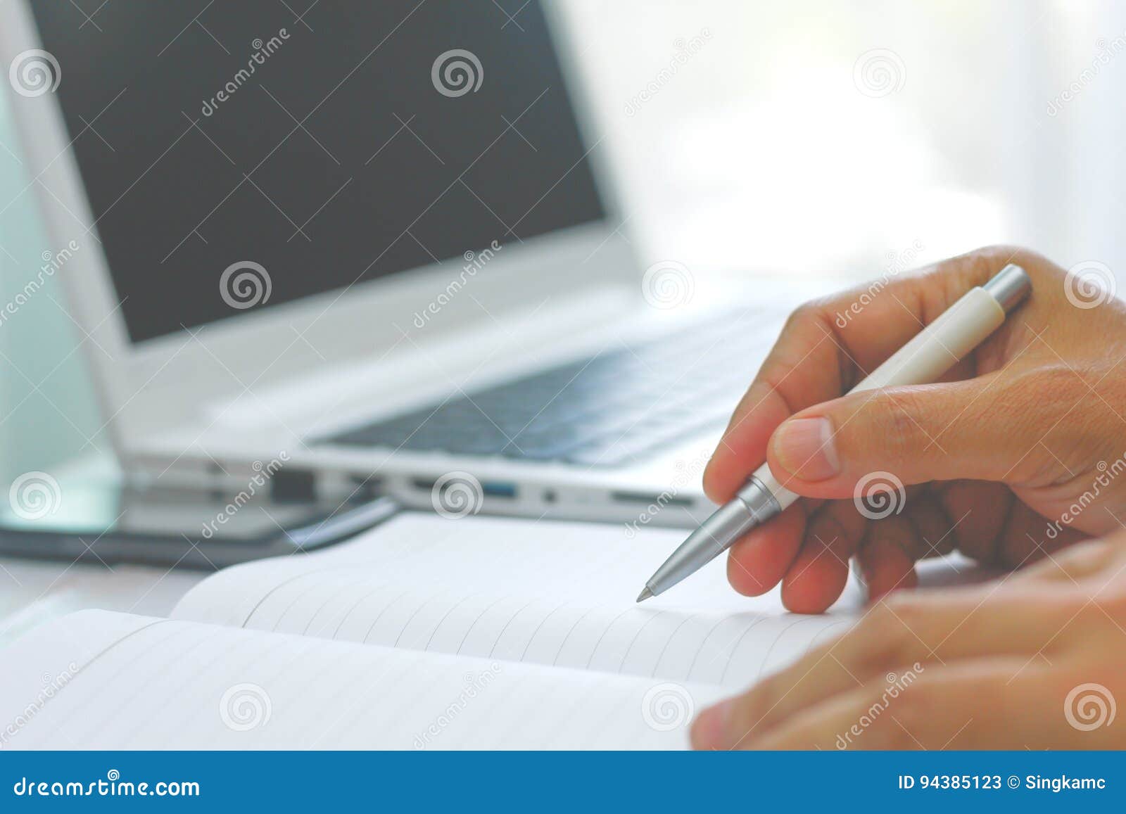 Blury Man`s Hands Holding a Pen Writing Stock Image - Image of finger ...