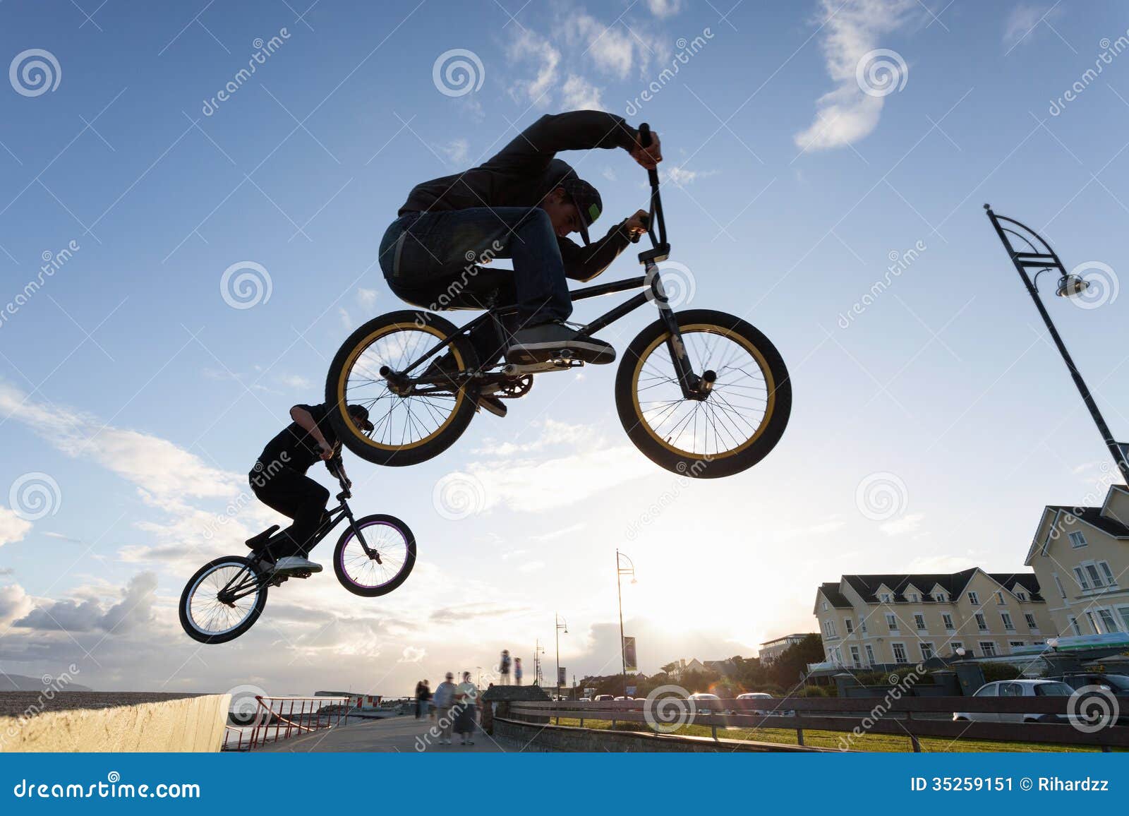 BMX stunts at the street stock image. Image of riding - 35259151