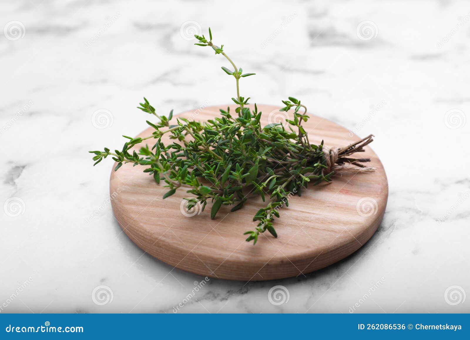 Board with Aromatic Fresh Thyme on White Marble Table Stock Photo ...