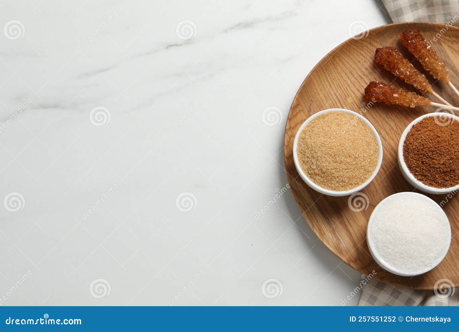 Board with Different Types of Sugar on White Marble Table, Top View ...
