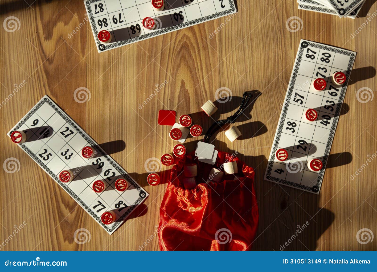 Board Game Fun with Vintage Bingo Set and Red Bag in Sunlight Stock ...