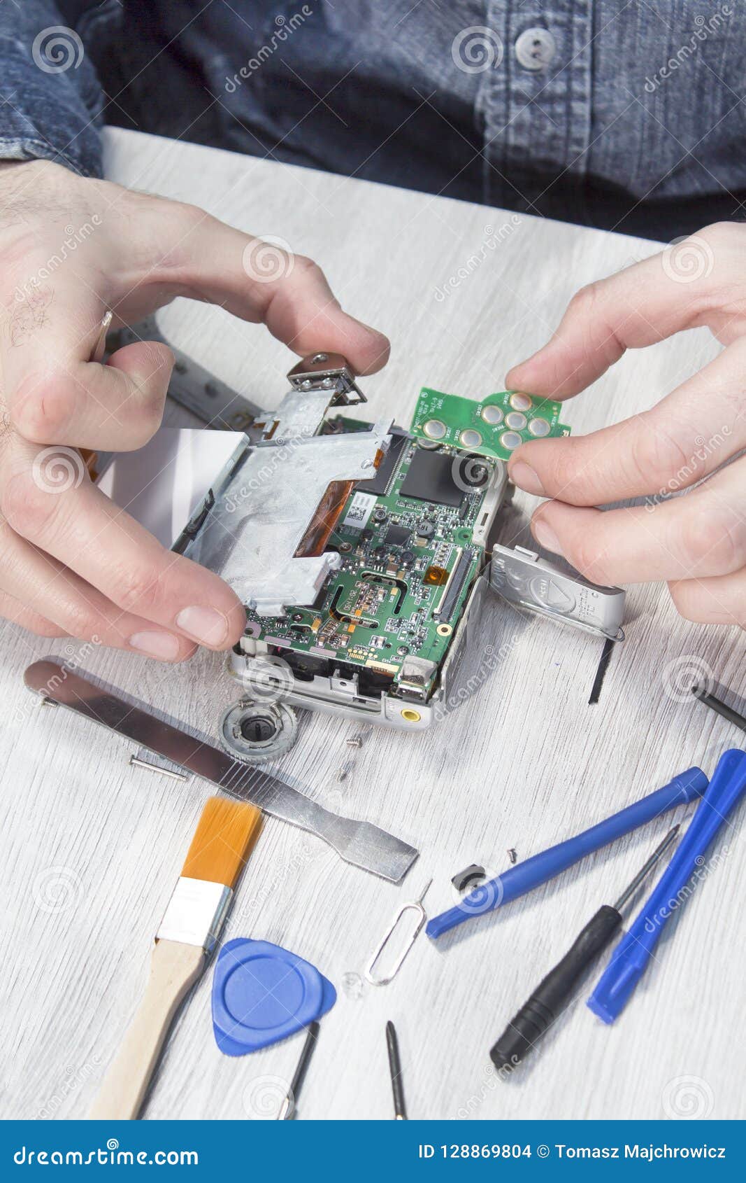 Broken Camera Disassembled in the Electronic Service. Stock Photo ...