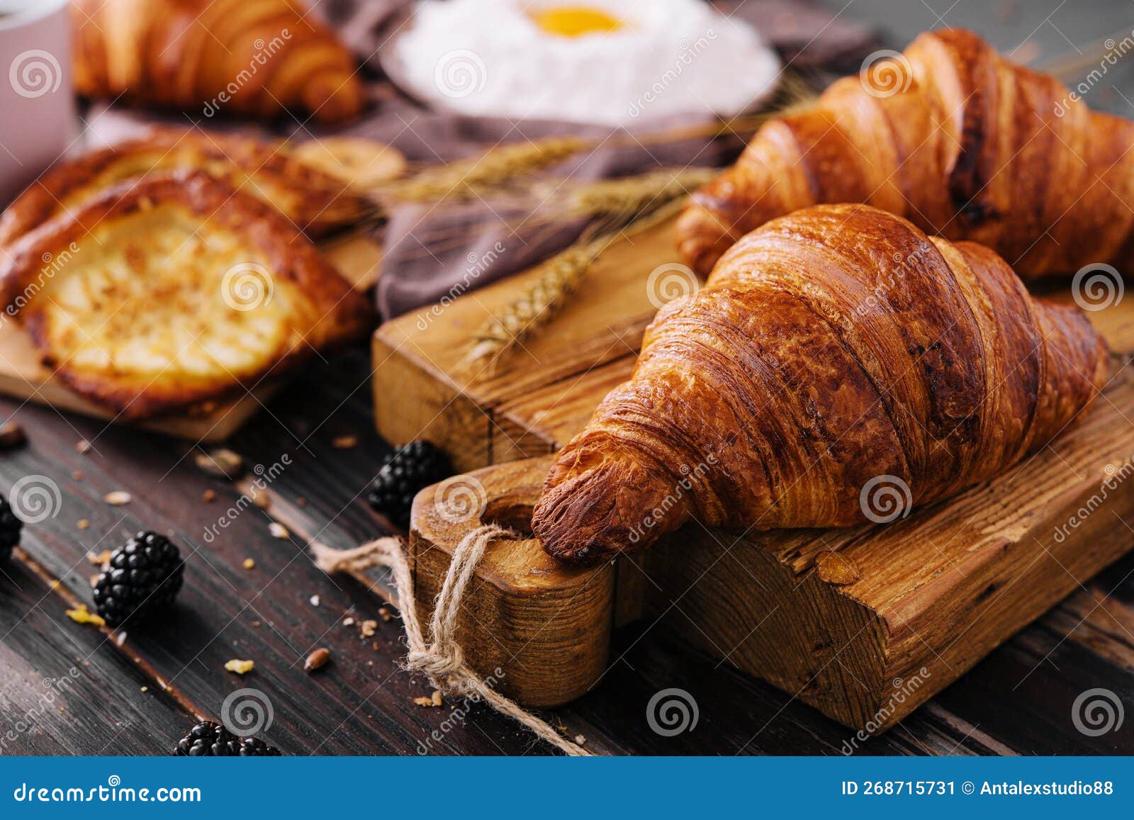 Board with Tasty Croissants and Pastries on Table Stock Image - Image ...