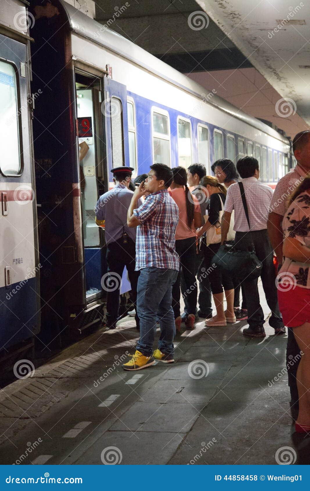 Board train at night editorial stock photo. Image of board - 44858458