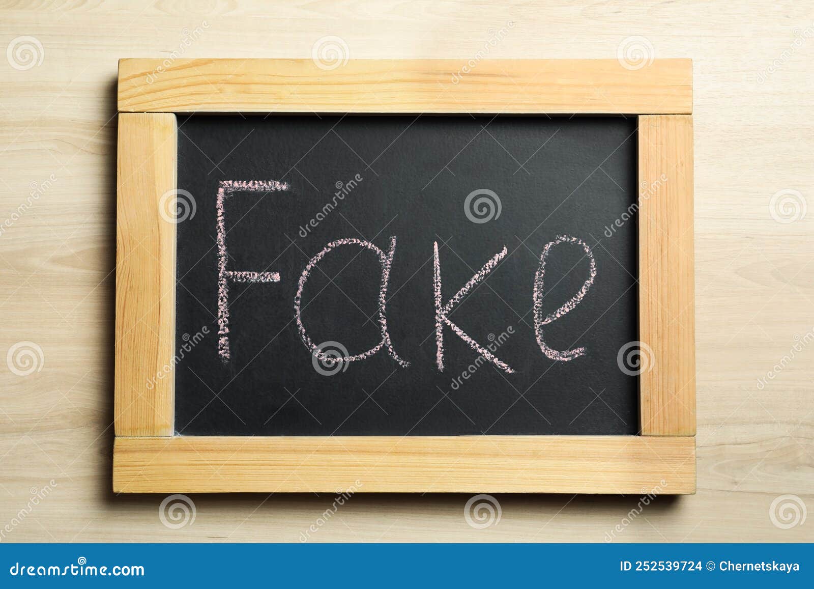 Board with Word FAKE on Wooden Table, Top View Stock Photo - Image of ...