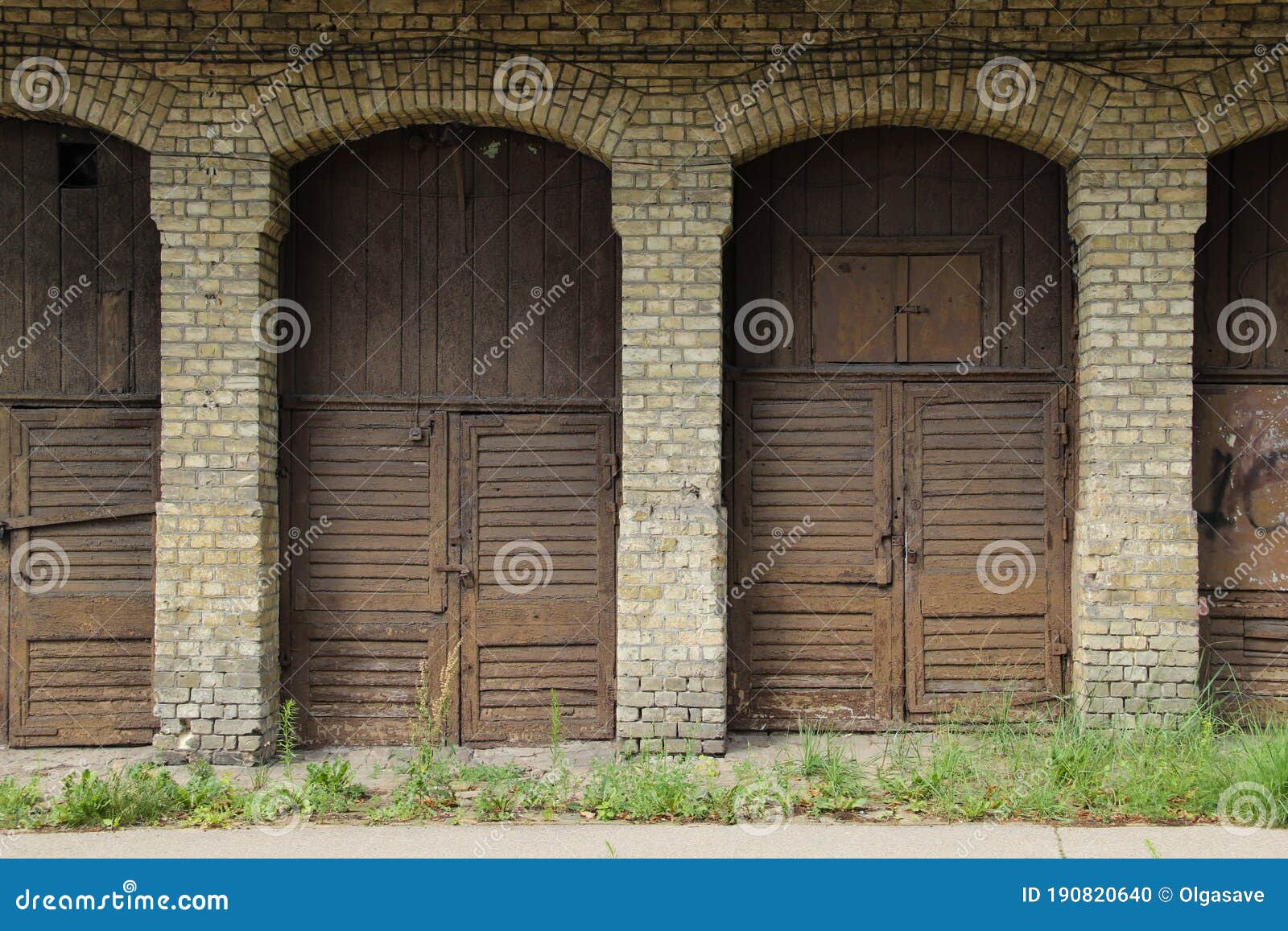 Boarded Arches of a Warehouse. Front View of the Shuttered Brick Arches ...