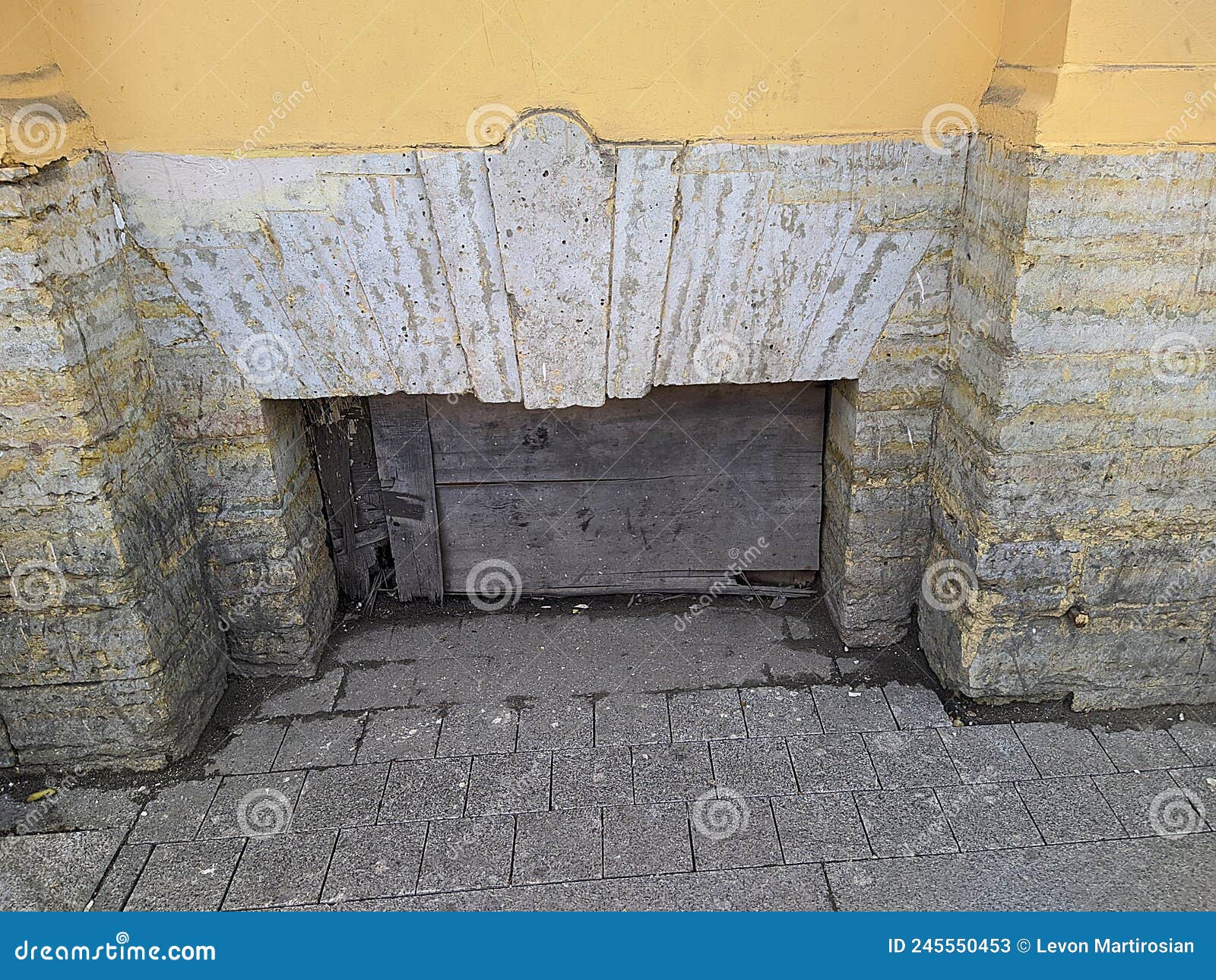 Boarded Up Basement Window of the Building View from the Street. Stock ...
