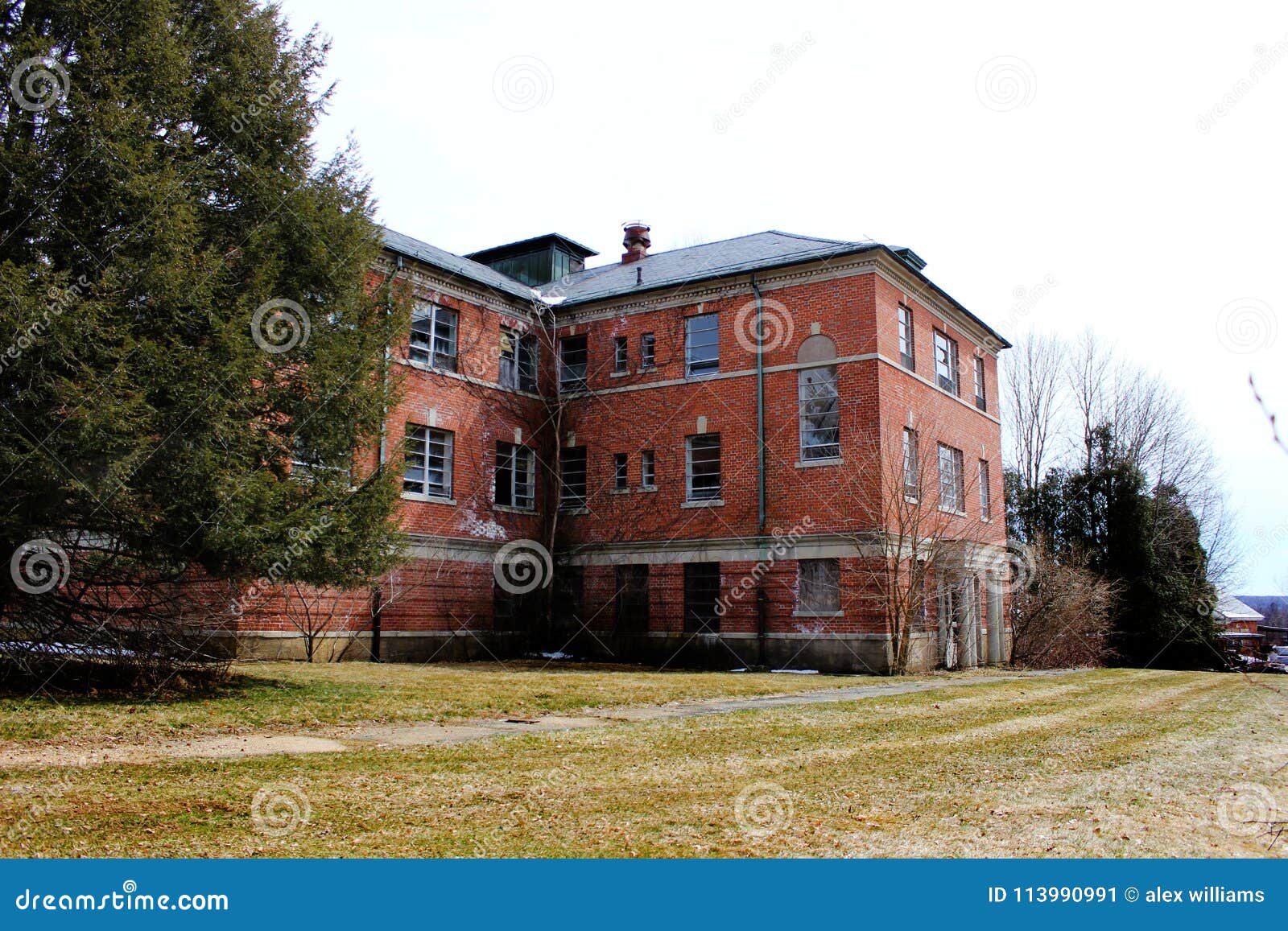 Old Broken Windows on Abandoned Brick Asylum Building Stock Image ...