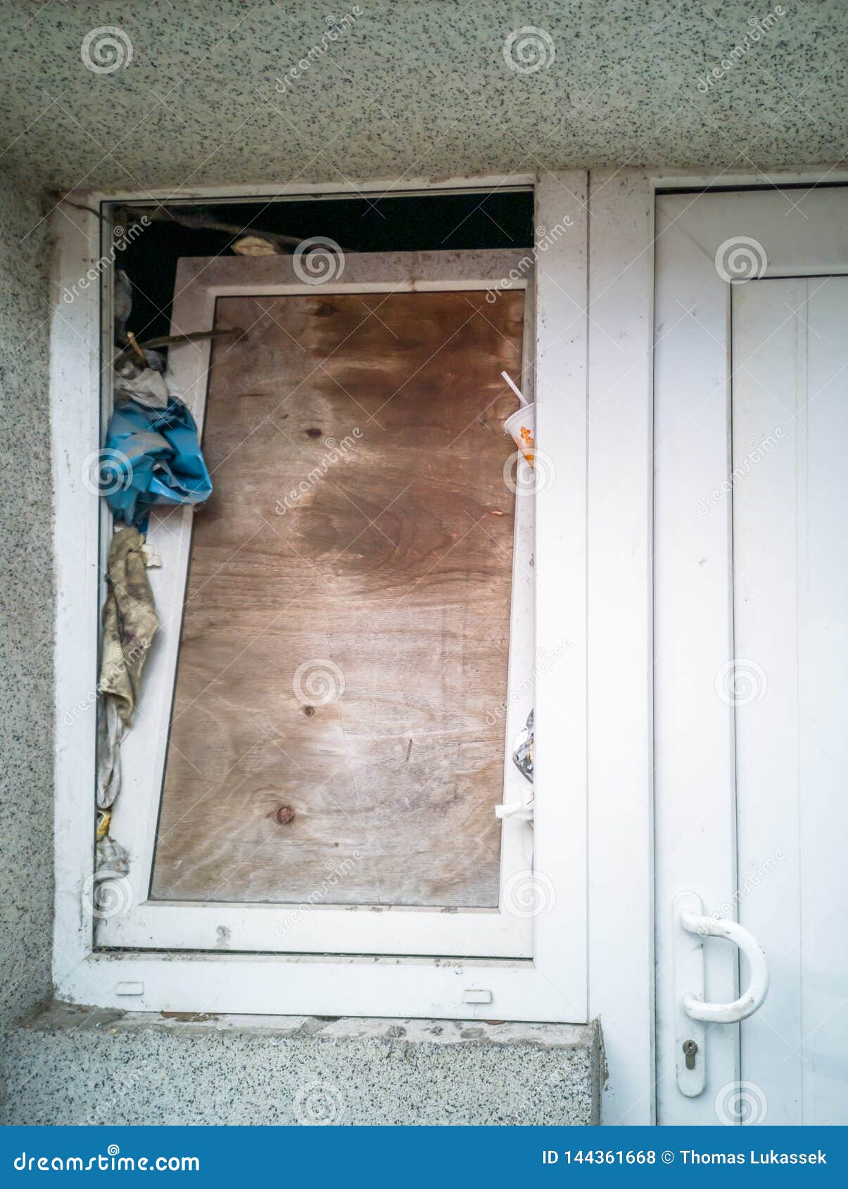 Boarded Up Window Next To Door of a House Stock Photo - Image of plank ...