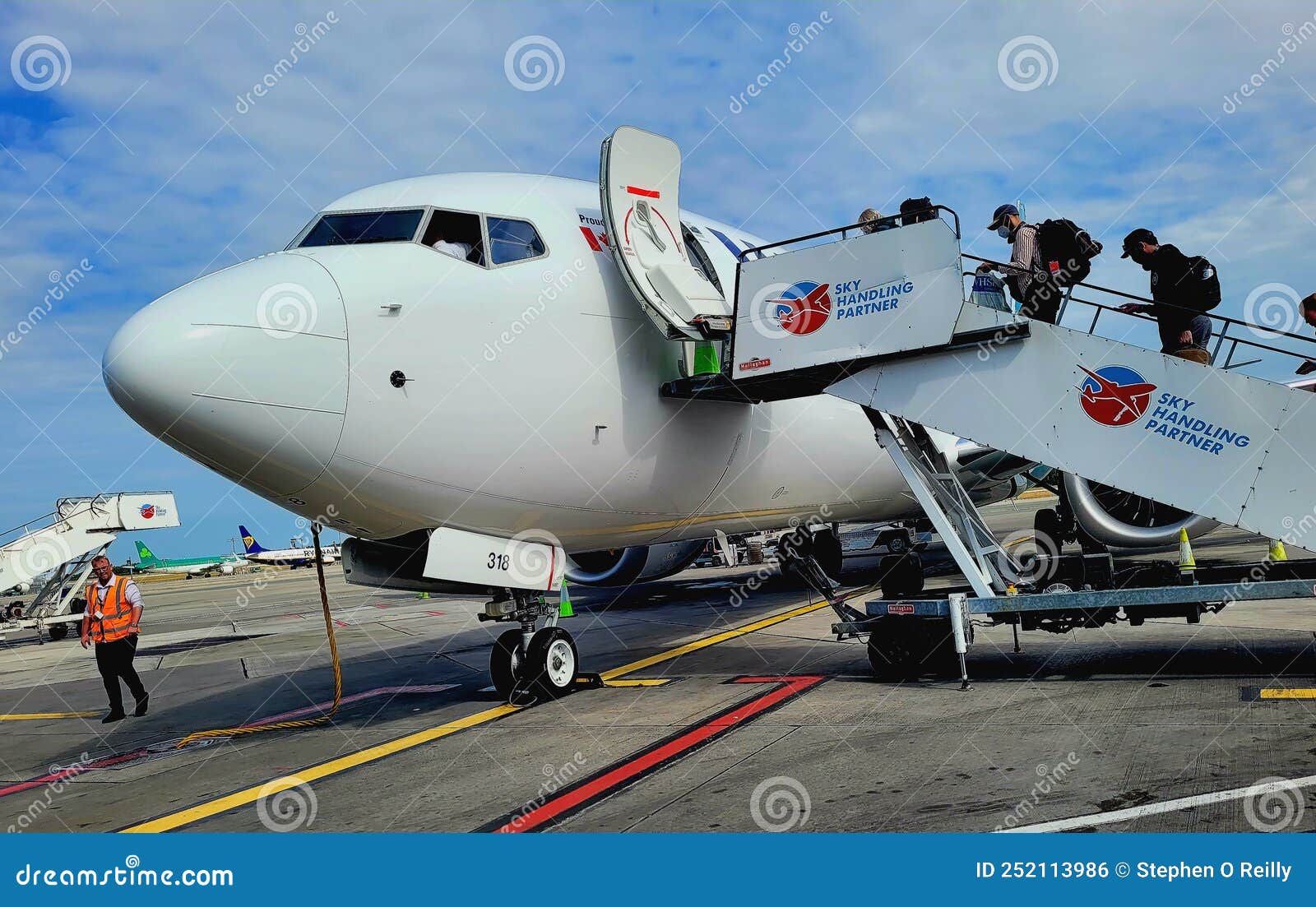 WestJet Boeing 737-800 Magic Plane With Mickey On The Tail Editorial ...