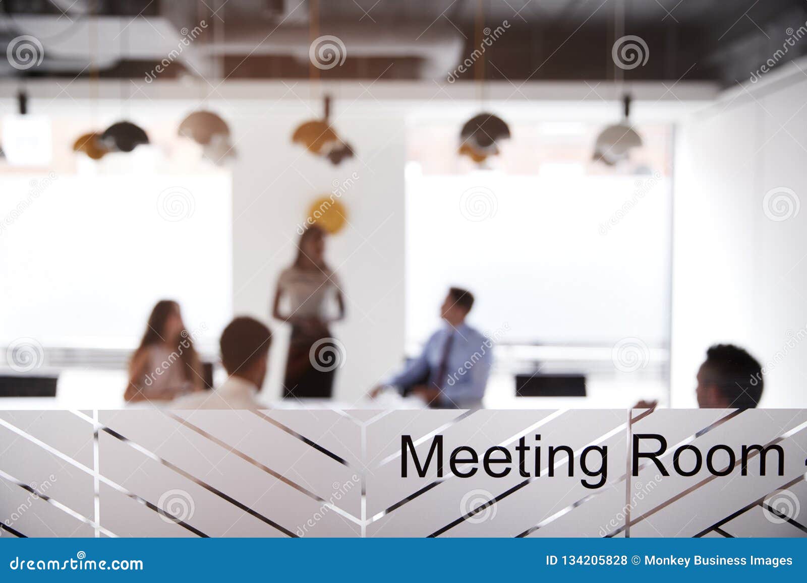 Boardroom Presentation Viewed through Meeting Room Window Stock Photo ...