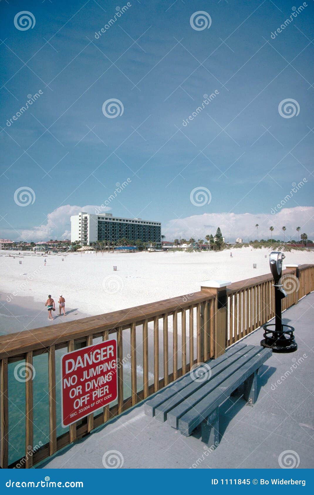 Boardwalk, Bench, And Sign At The Beach Royalty-Free Stock Photo ...