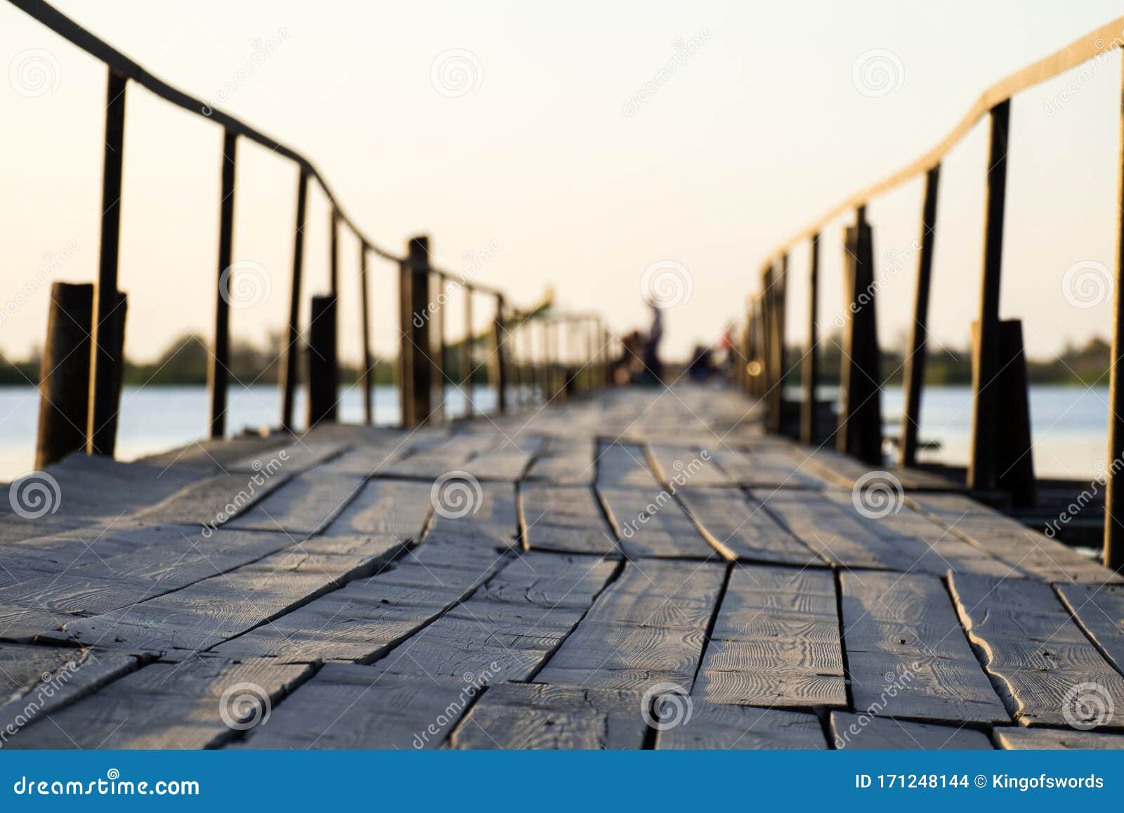 Boardwalk Bridge Over the Lake in the Morning Sun Stock Photo - Image ...